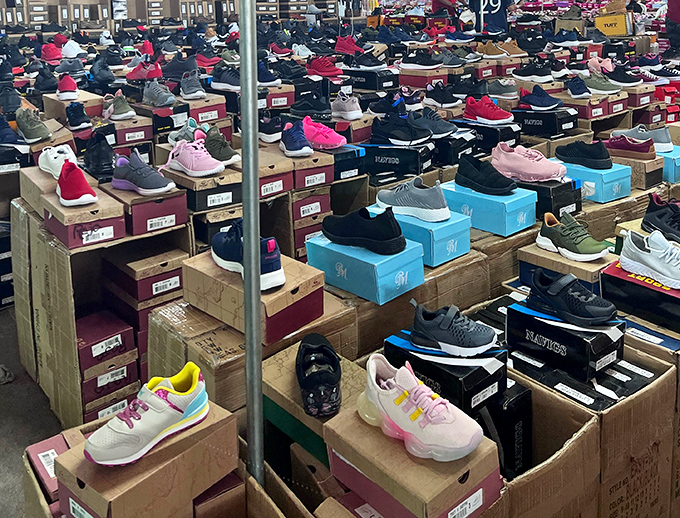 Shoe paradise or sneaker heaven? Either way, this vendor's display would make Imelda Marcos reconsider her life choices.