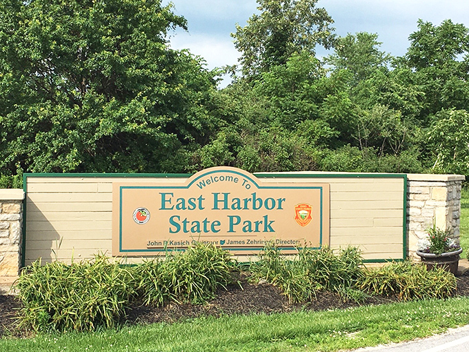 The welcoming sign that promises adventure ahead. Like finding the entrance to Narnia, but with fewer talking animals and more fishing opportunities.