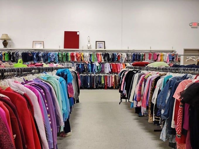 Rainbow rivers of clothing flow through Value World's interior, each rack a potential goldmine of fashion finds waiting to be discovered.