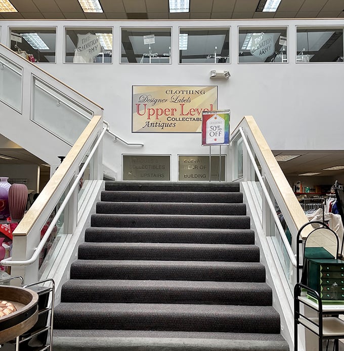 This stairway might as well be labeled "This Way to Hidden Treasures" &ndash; the upper level beckons with promises of designer finds and vintage collectibles.