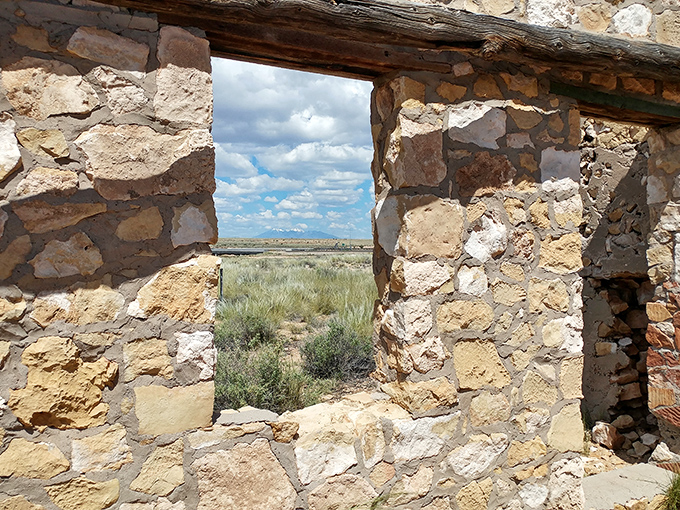 Stone windows frame the endless Arizona sky better than any fancy gallery could ever manage.