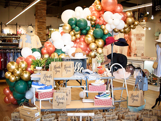 Celebration central! Nothing says "we appreciate your business" like a balloon extravaganza worthy of a fashion finale.