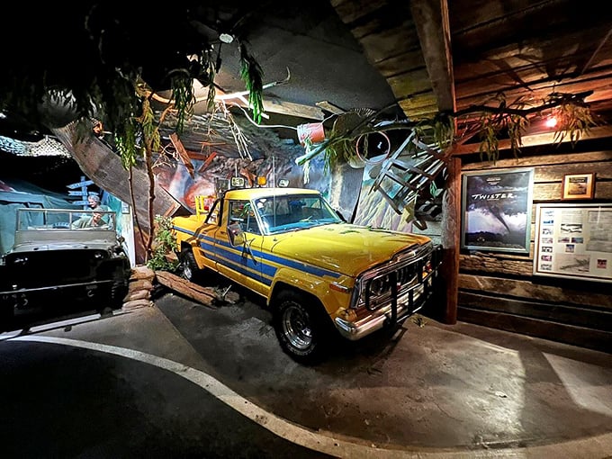The "Twister" storm-chasing pickup truck, surrounded by debris and weather maps, makes you feel the adrenaline rush of tornado hunting without the actual peril of flying cows.