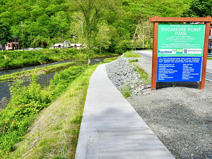 Sycamore Point Park offers a peaceful riverside retreat where the only rush hour involves ducks navigating the gentle current.