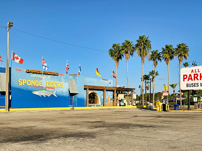 The Sponge Factory welcomes visitors with its vibrant blue facade and promise of maritime treasures&mdash;a colorful gateway to Tarpon Springs' unique industry.