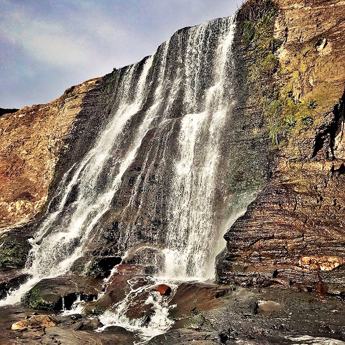 The hypnotic cascade creates a natural symphony &ndash; part gentle whisper, part thunderous applause. Mother Nature's standing ovation for those who made the trek.