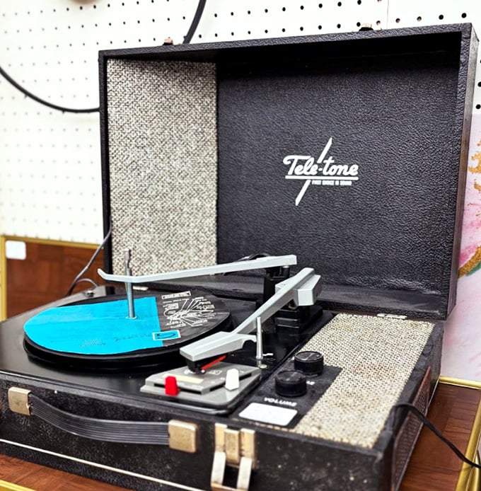 That blue vinyl on a vintage Teletone isn't just a record player—it's a time machine waiting to transport you back to someone's first dance.
