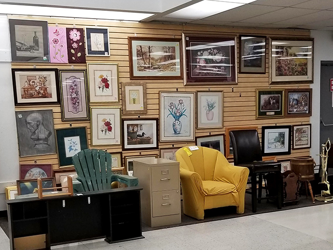 A gallery wall that rivals MoMA, except here you can actually afford to take everything home. That yellow chair is practically screaming "Try me!"