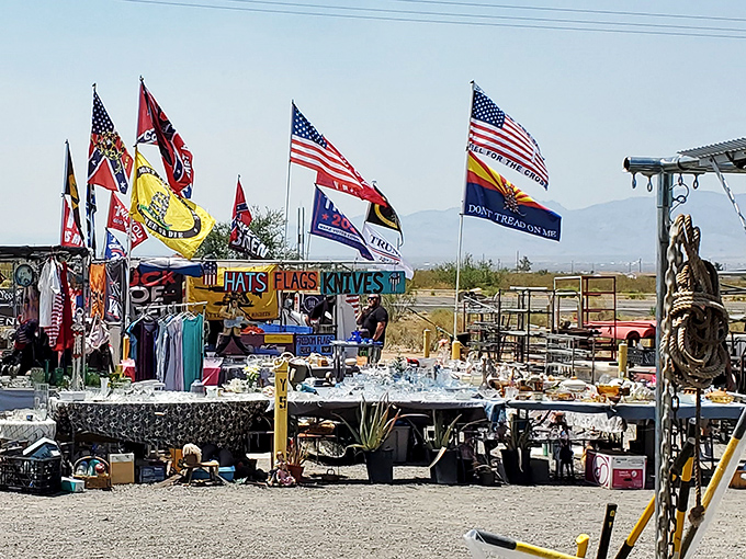 A patriotic display that would make Uncle Sam proud! This vendor's colorful array of flags, hats, and knives creates a stars-and-stripes shopping experience.