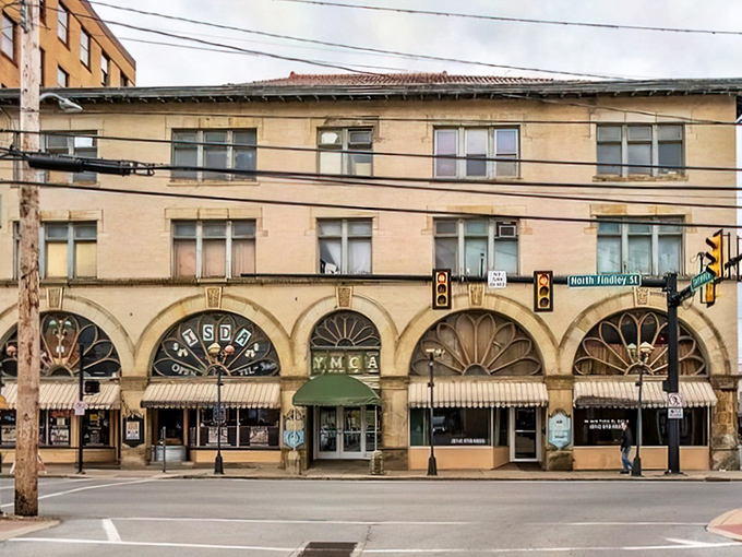 The YMCA building's distinctive arched windows aren't just pretty&mdash;they're portals to a time when buildings had character and social security checks could actually secure something.