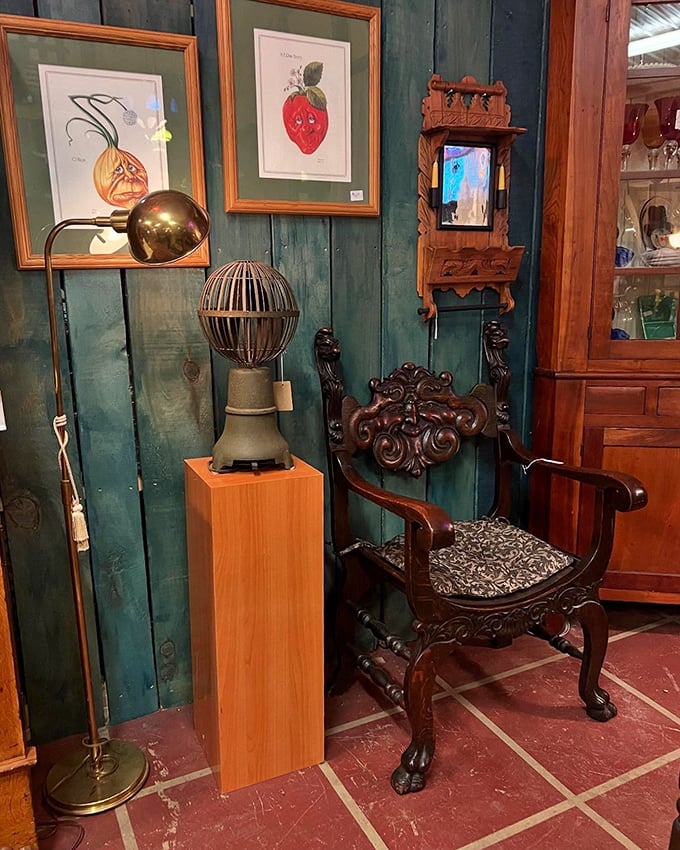 The teal-walled nook featuring an ornate chair and vintage prints feels like the world's most interesting waiting room. Your smartphone suddenly seems very&hellip; new. 