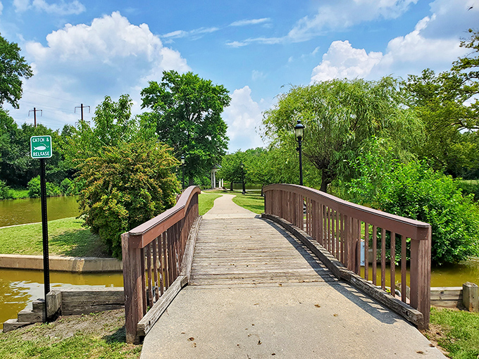 This wooden bridge invites you to cross over to tranquility. Like stepping into a Bob Ross painting, but with fewer "happy little trees."