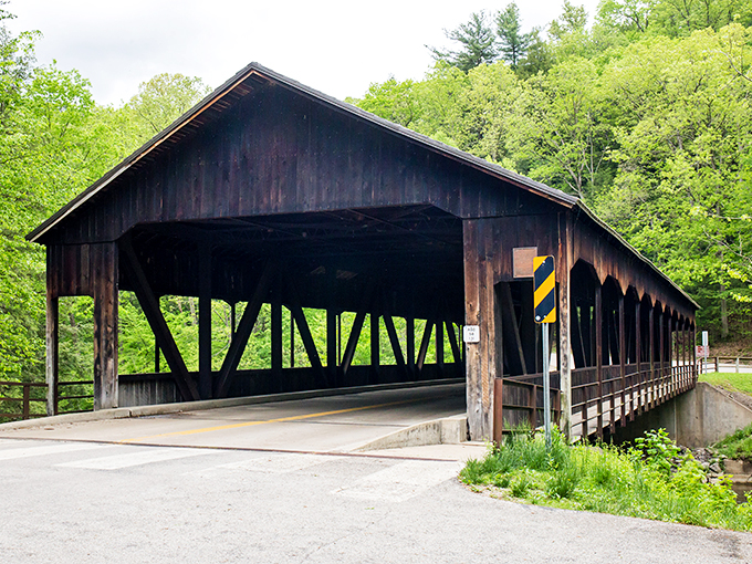This isn't just any covered bridge &ndash; it's a time machine disguised as architecture, offering passage to simpler days amid Mohican's lush surroundings.