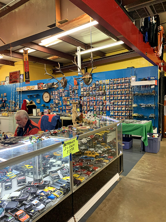 Miniature automotive dreams line these display cases. For collectors, this isn't just a booth&mdash;it's a museum where you can actually take the exhibits home.