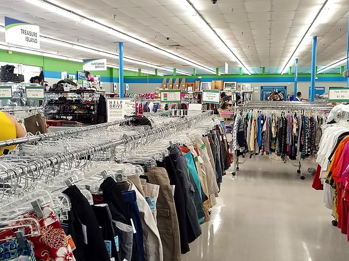 Clothing racks stretch to the horizon, each hanger a possibility, each garment a story waiting for its next chapter.
