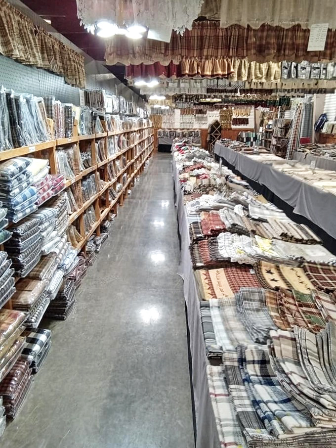 Quilter's paradise where patterns tell stories. Each fabric square represents hours of craftsmanship and generations of tradition.