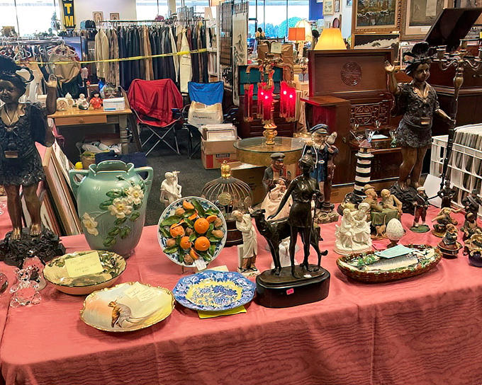 This table tells a hundred stories&mdash;each figurine and decorative plate once graced someone's home before finding its way here.