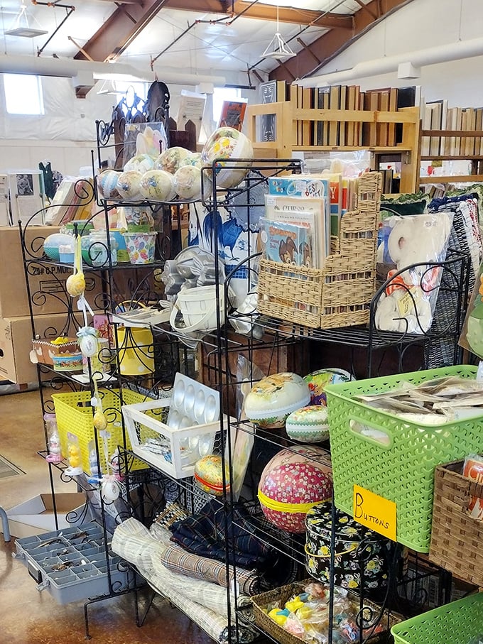 This vendor's carefully curated chaos is someone else's future collection. Notice the baskets, books, and decorative items all competing for attention.