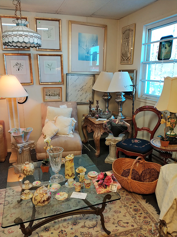 A perfectly staged living room vignette that whispers, "Your home could tell stories too." That Tiffany-style lamp alone is worth the trip.