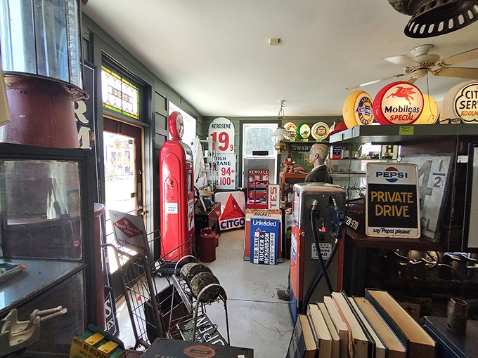 Nostalgia alley! This collection of vintage gas pumps and automotive memorabilia would make any car enthusiast's heart rev with excitement.