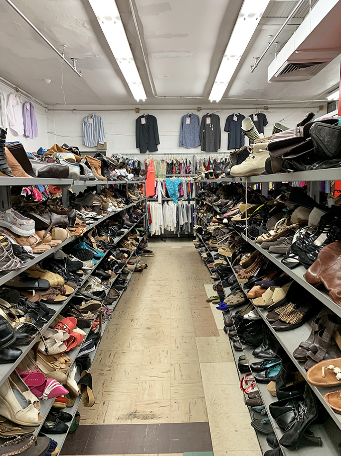 The footwear section: an archaeological expedition where vintage loafers, barely-worn heels, and practical boots await their second act on new feet.