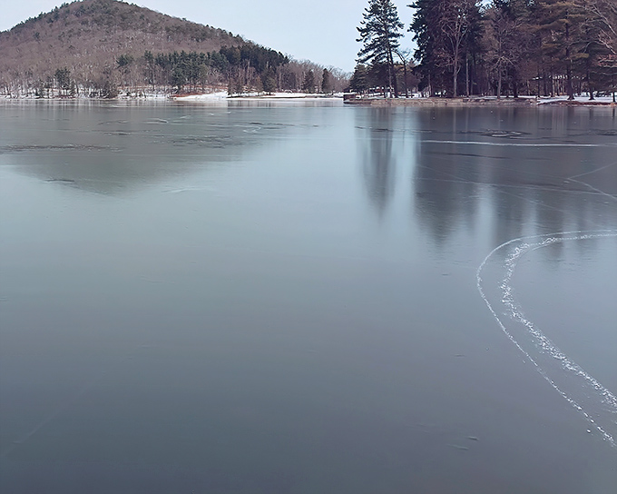 Winter transforms Cowans Gap Lake into a serene ice kingdom. Those delicate cracks tell stories of freezing nights and patient waters.