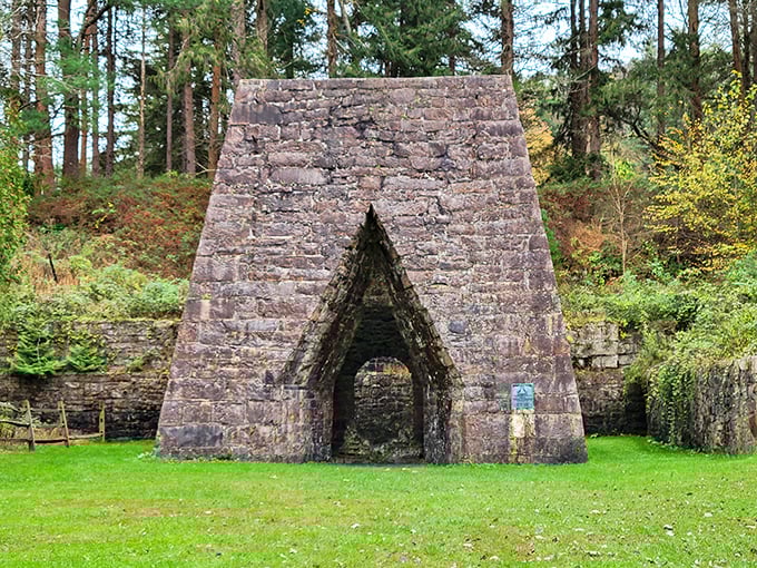 Standing before this iron furnace feels like discovering a medieval castle that actually helped build America.