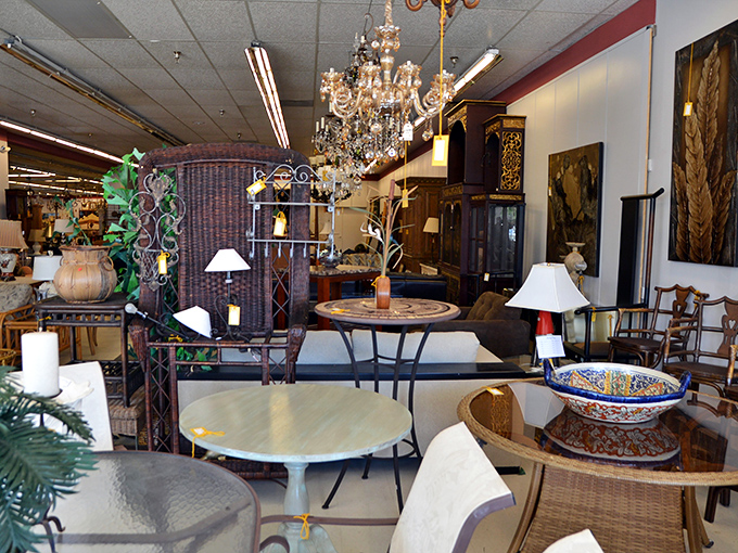 Mid-century meets Mediterranean in this carefully curated corner. That crystal chandelier has probably witnessed more dinner parties than a catering company.