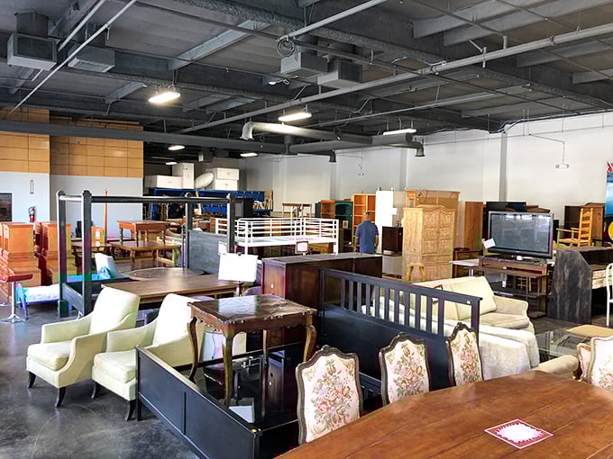 A furniture forest where every piece tells a story. That dining set might have hosted family dinners for years before waiting here for its second act.