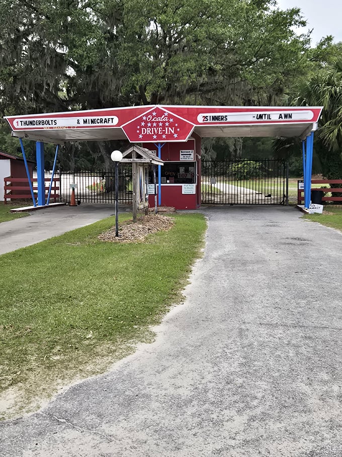 This charming entrance gate, with its red and blue Americana color scheme, might as well be labeled "Time Machine" instead of "Ocala Drive-In."