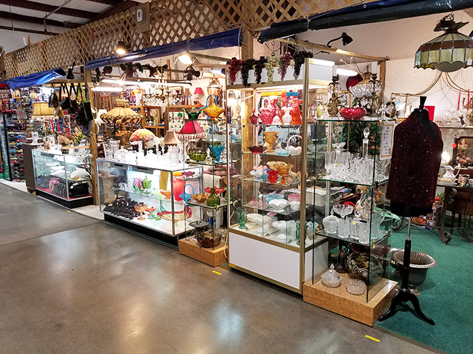 Glass cases gleaming with possibilities. Vintage treasures await behind these crystal barriers, each shelf a time capsule of someone's cherished memories.