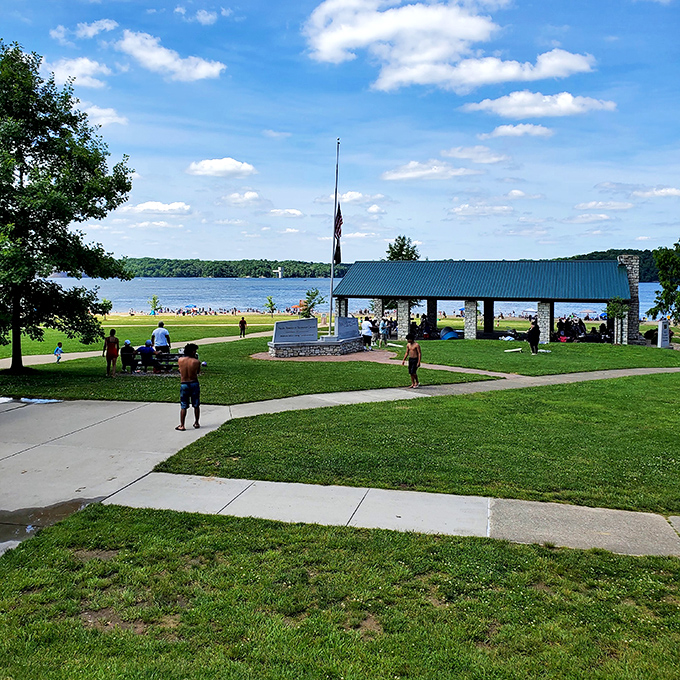 The park's pavilion area offers a perfect respite from the sun, with the American flag standing proud against that impossibly blue Ohio sky.