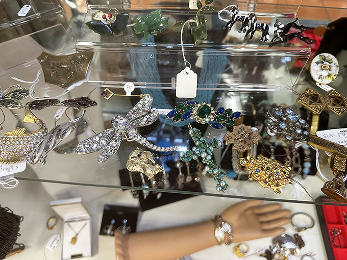 Treasure hunters rejoice! This glittering display case showcases decades of adornment philosophies, from rhinestone glamour to timeless elegance.