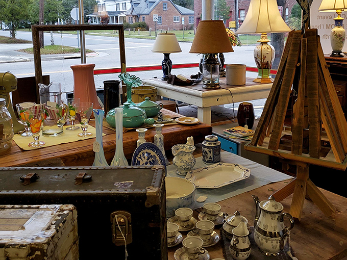 A symphony of colored glass catches the light while vintage lamps stand at attention, ready to illuminate someone's next chapter of stories. 