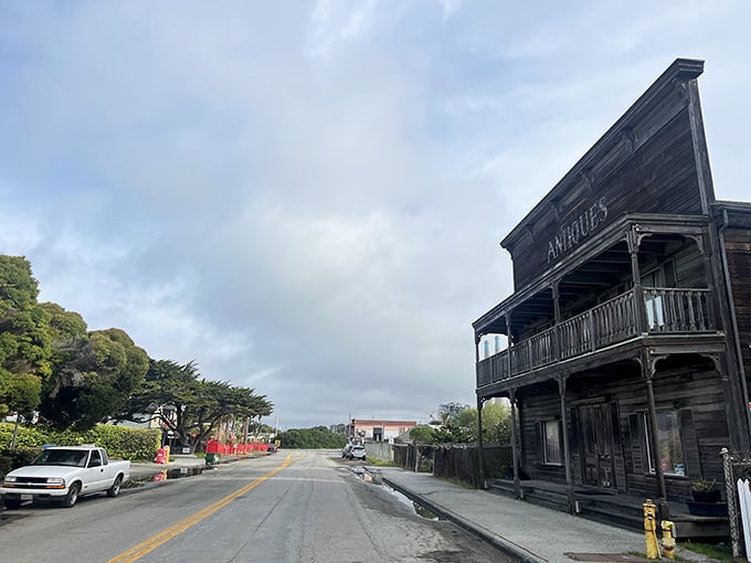 Time stands still on this stretch of coastal Americana. The antique shop beckons with treasures while the road whispers promises of seafaring adventures.