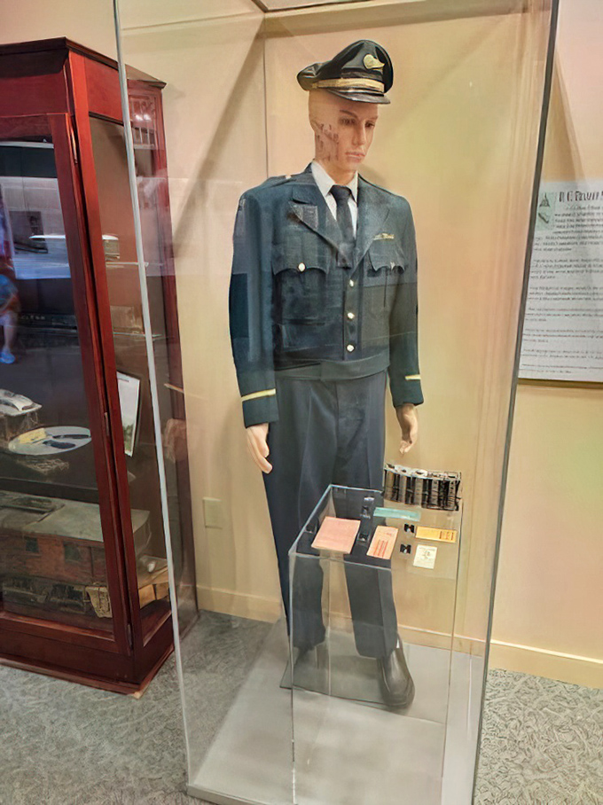 This dapper conductor mannequin stands eternally at attention, ready to collect fares and announce stops that haven't existed for decades. His uniform tells stories his lips never will.