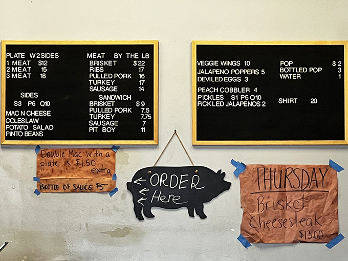 The chalkboard menu speaks the universal language of barbecue devotees&mdash;meat by the pound, classic sides, and daily specials that inspire regular pilgrimages.