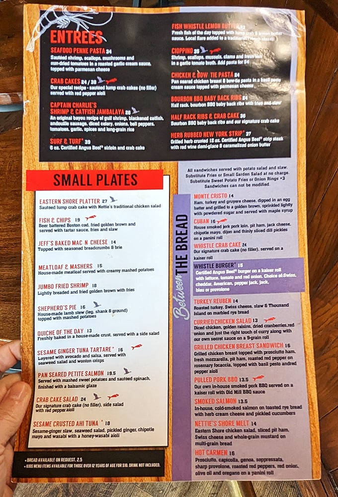 This menu reads like a love letter to the Chesapeake Bay. The "no filler" note beside the crab cakes isn't marketing&mdash;it's a solemn promise.