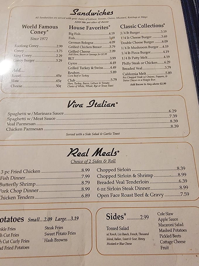 A menu that hasn't surrendered to food trends or inflation wars. The "World Famous Coney" proudly leads the lineup, while "Real Meals" deliver exactly what they promise.