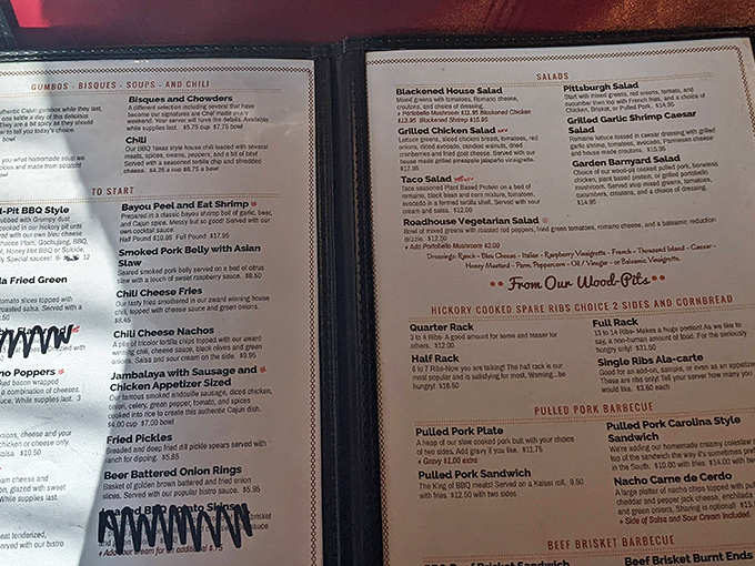 A menu that reads like a love letter to smoked meats and Southern comfort, offering everything from Bayou Peel and Eat Shrimp to Pittsburgh Salad.