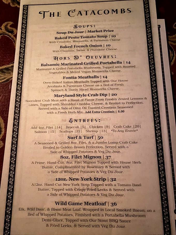 The Catacombs menu reads like a culinary treasure map. That Wild Game Meatloaf wrapped in local smoked bacon? Your taste buds just found X marks the spot.