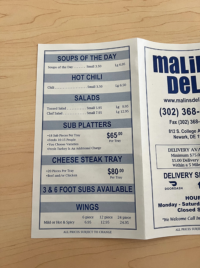 The menu tells a delicious story – from hearty soups to massive party subs. Notice those 3 and 6-foot options? That's not a sandwich, that's a commitment!