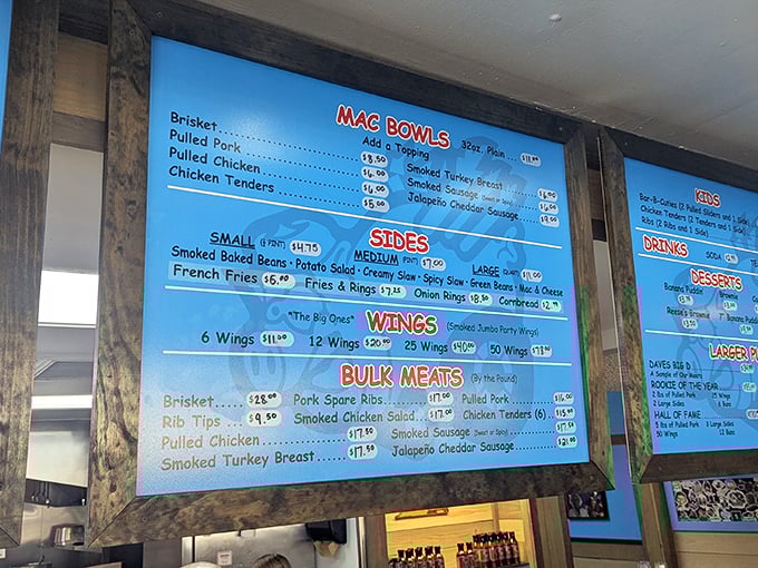 This menu board isn't just a list&mdash;it's a roadmap to happiness with brisket, pulled pork, and mac bowls that would make a cardiologist both worried and jealous.