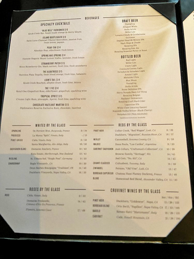 The cocktail menu reads like a love letter to libation enthusiasts. From Blue Bell Fashioned to Chocolate Hazelnut Martinis, decisions have never been so deliciously difficult.