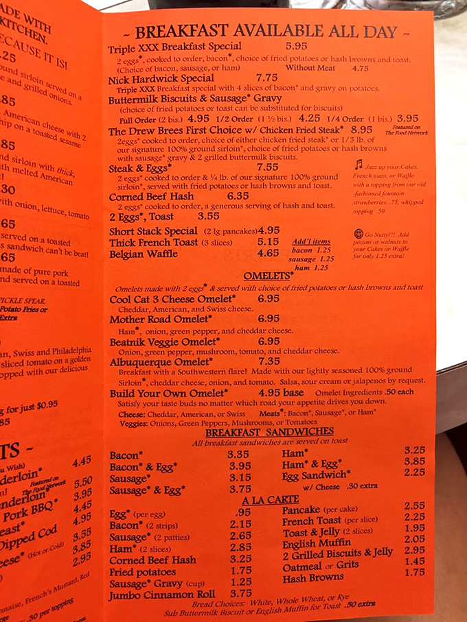 This isn't just a menu; it's a roadmap to happiness. The orange pages practically glow with the promise of comfort food salvation.