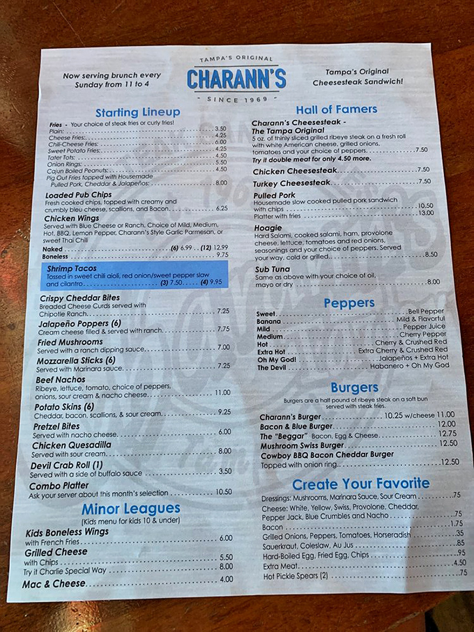 The menu reads like a love letter to comfort food. Notice how they call appetizers the "Starting Lineup" &ndash; because in Tampa, even food has team spirit.