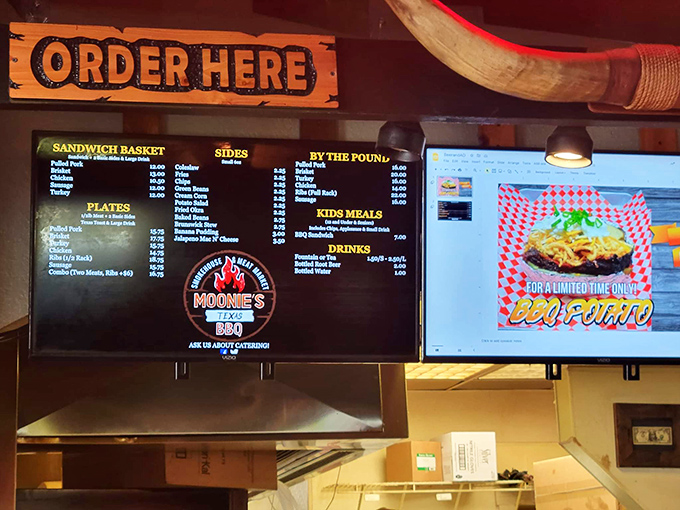 The menu board at Moonie's tells a simple story: meat, sides, and happiness. No fancy descriptions needed when the food speaks this eloquently for itself.