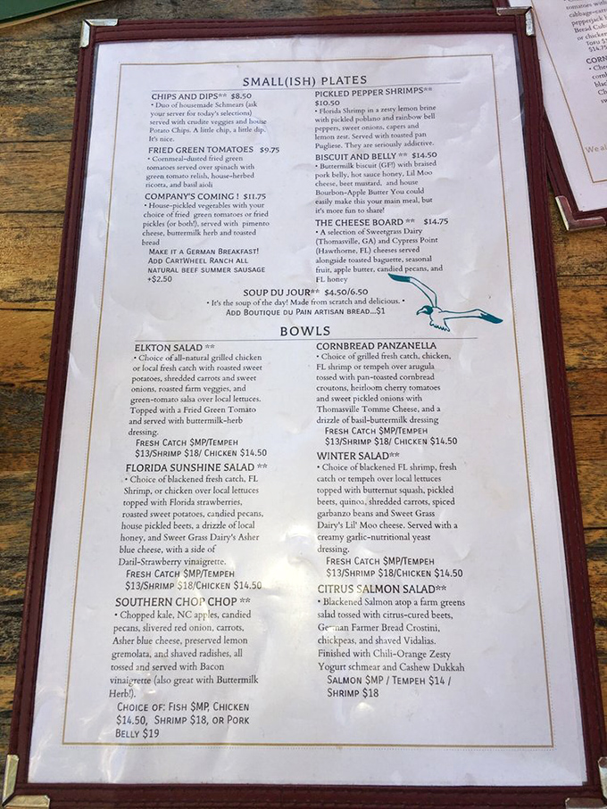 The menu reads like a love letter to Southern cuisine, with each dish telling a story of local farms and Florida's abundant harvests.