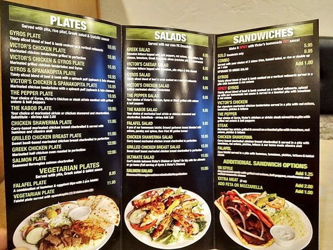 The menu board reads like a Mediterranean greatest hits album. Each section promises a different journey for your taste buds.