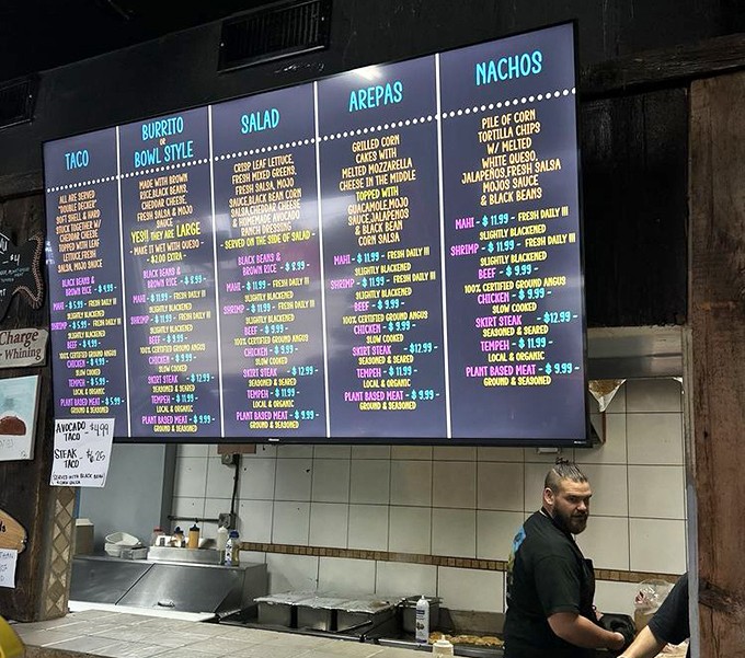 Decision paralysis has never been so delicious. The illuminated menu board offers a roadmap to flavor country with options that'll make your stomach growl.